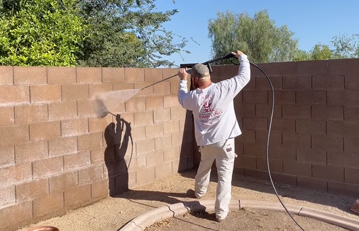 How to paint a cinder block fence in Arizona.